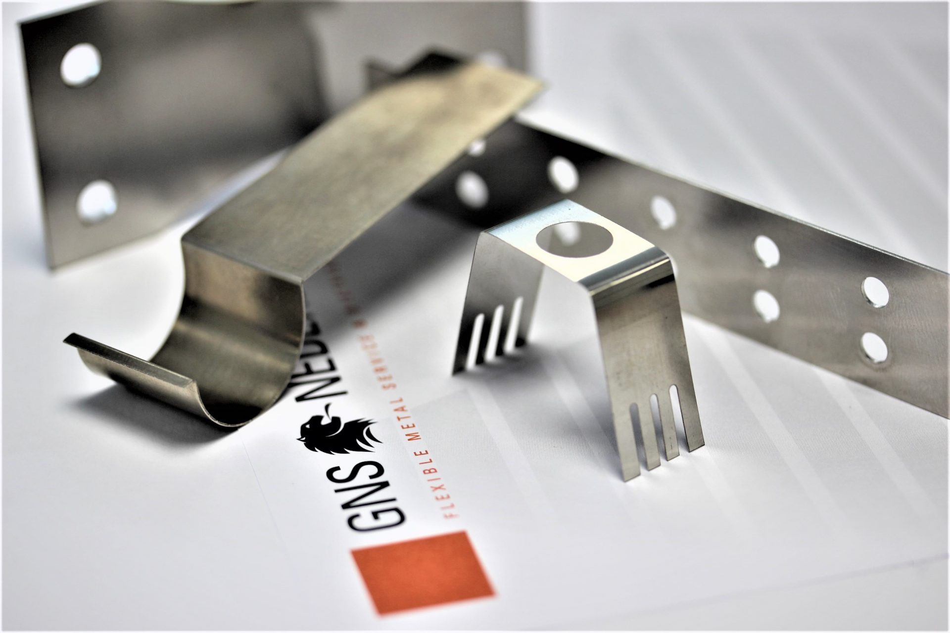 Cutting and folding of spring steel - GNS Nederland